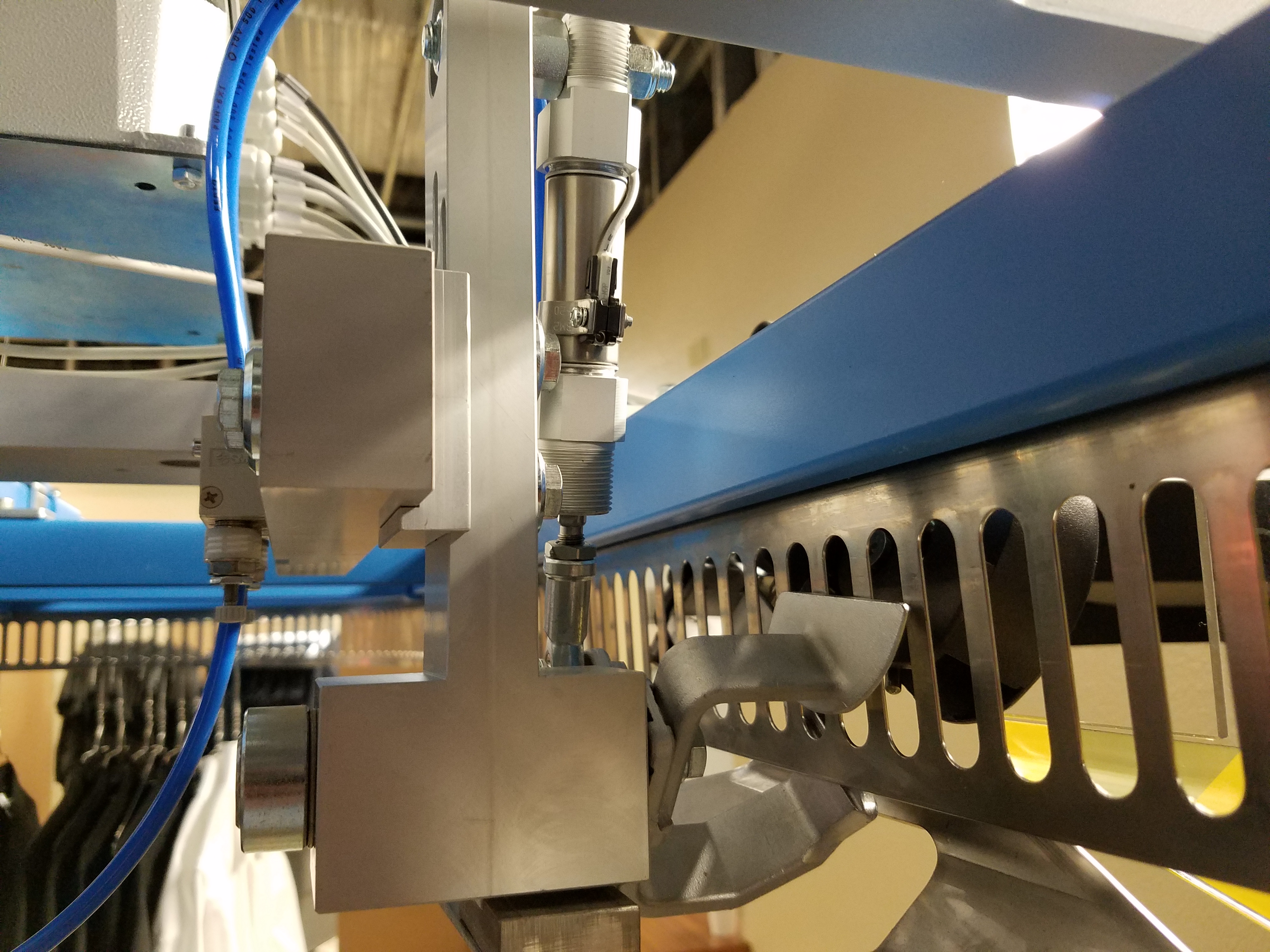 Metalprogetti USA - Automated Garment Assembly & Distribution